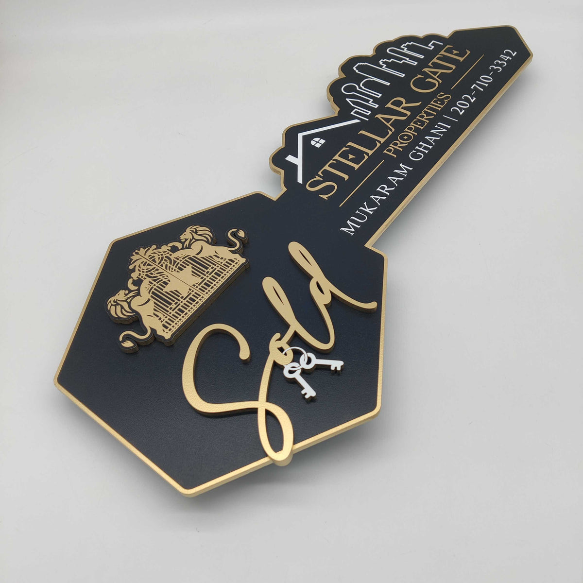 Key-Shaped Sign "Stellar Gate" – Real Estate Store