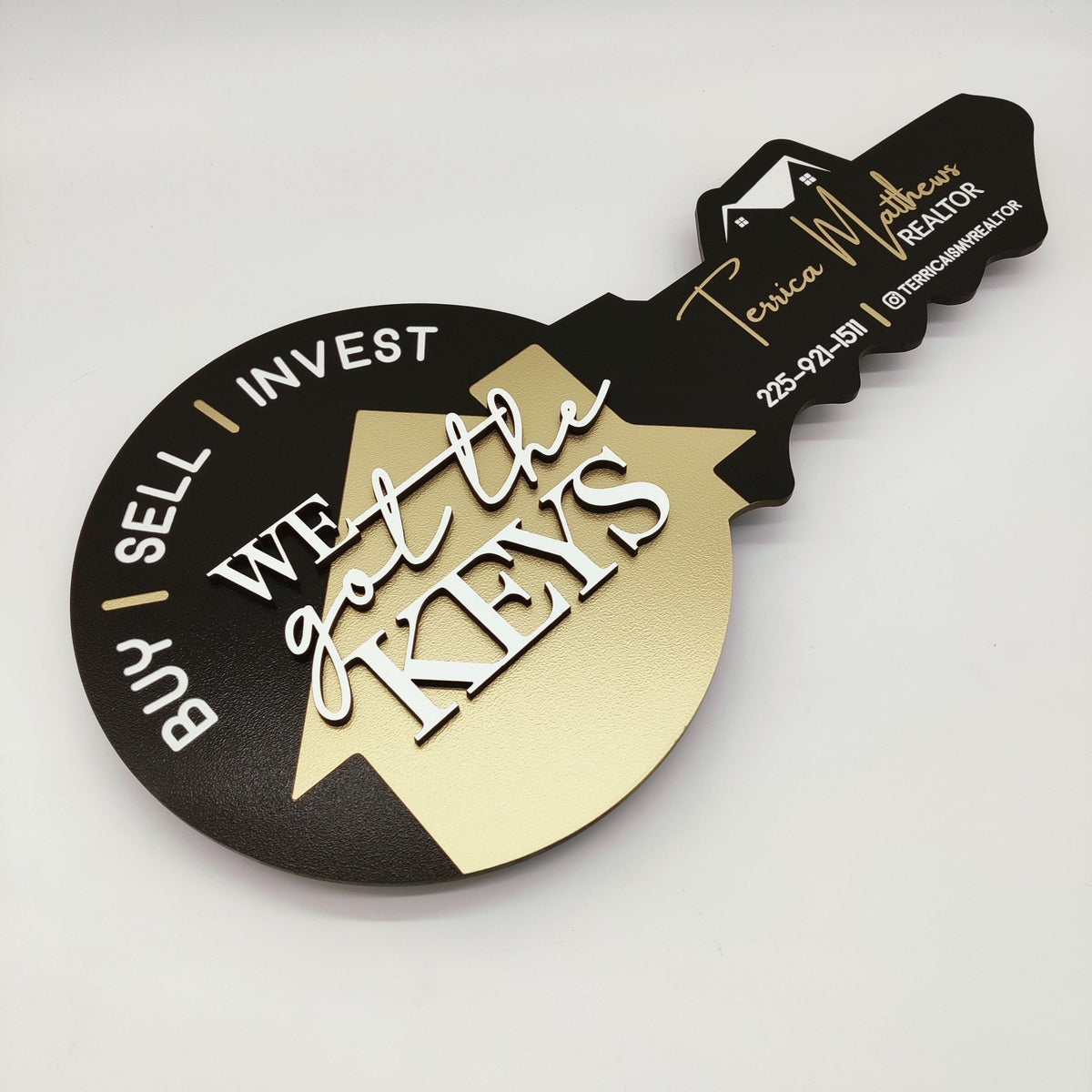 Round Shaped Key Sign "Buy, Sell, Invest" – Real Estate Store